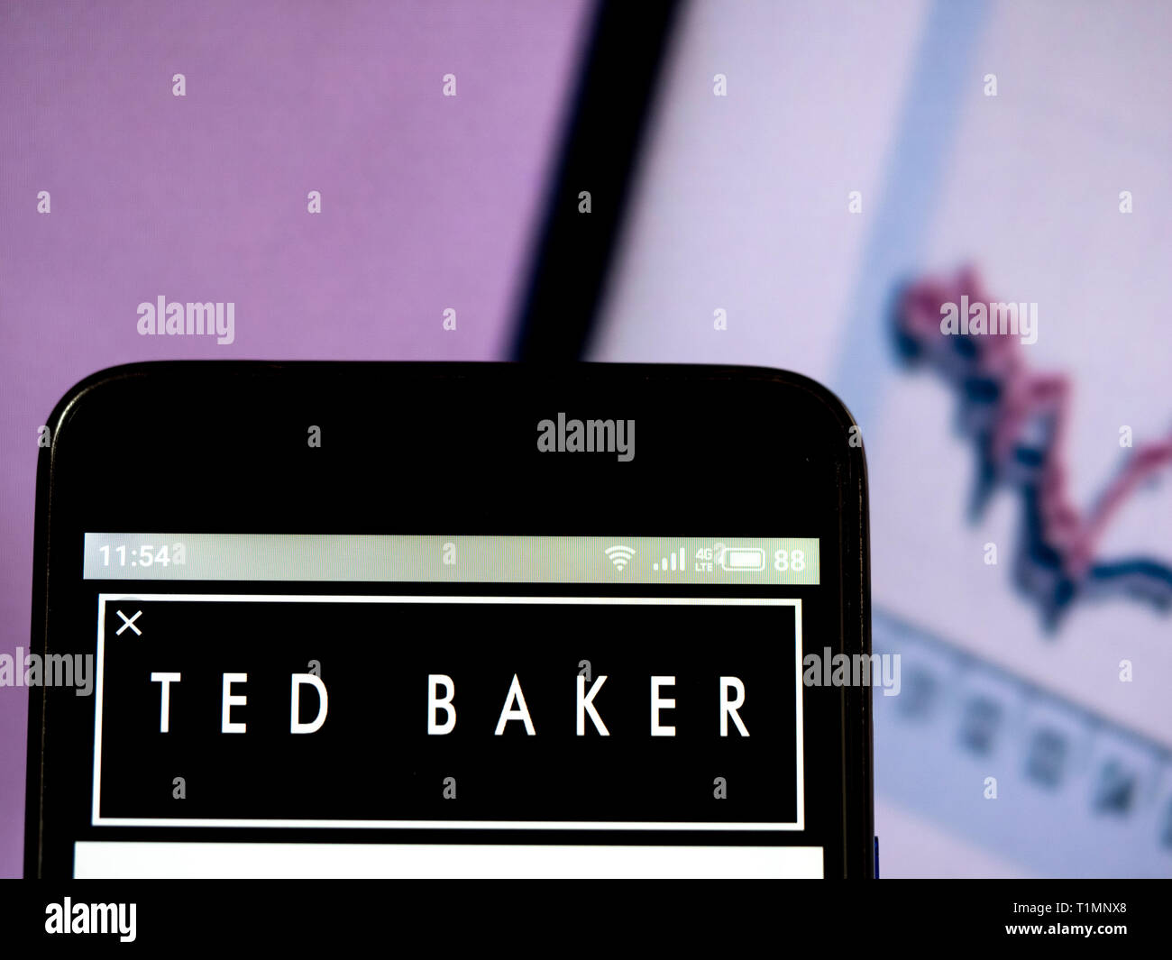 In this photo illustration a Ted Baker plc logo seen displayed on a ...