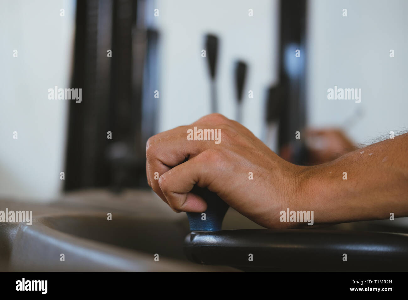 hand operating forklift truck in factory warehouse Stock Photo - Alamy