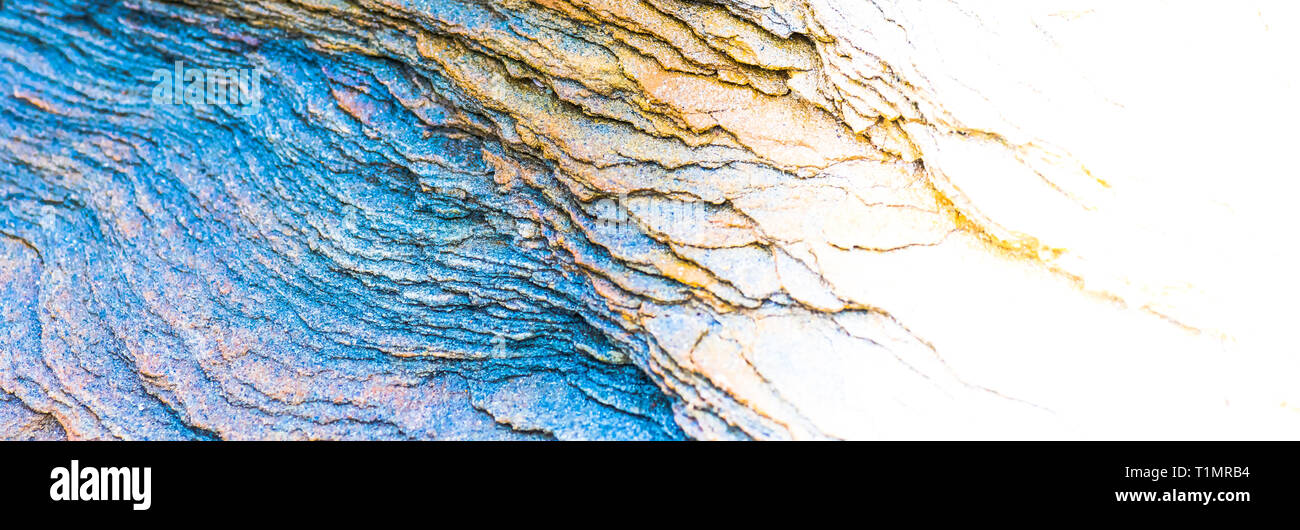 Blue, orange, white, yellow sedimentary rocks - colourful rock layers ...