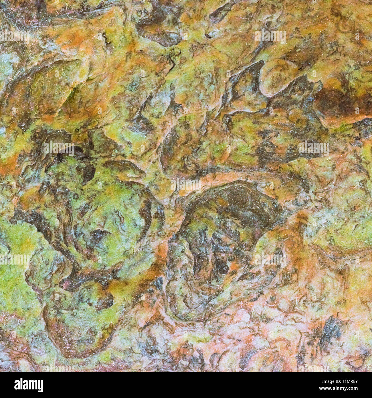 Green, orange, blue and yellow sedimentary rocks - colourful rock ...