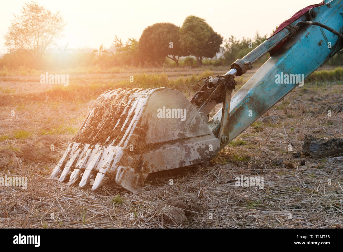 excavator backhoe digger tractor at construction site Stock Photo - Alamy