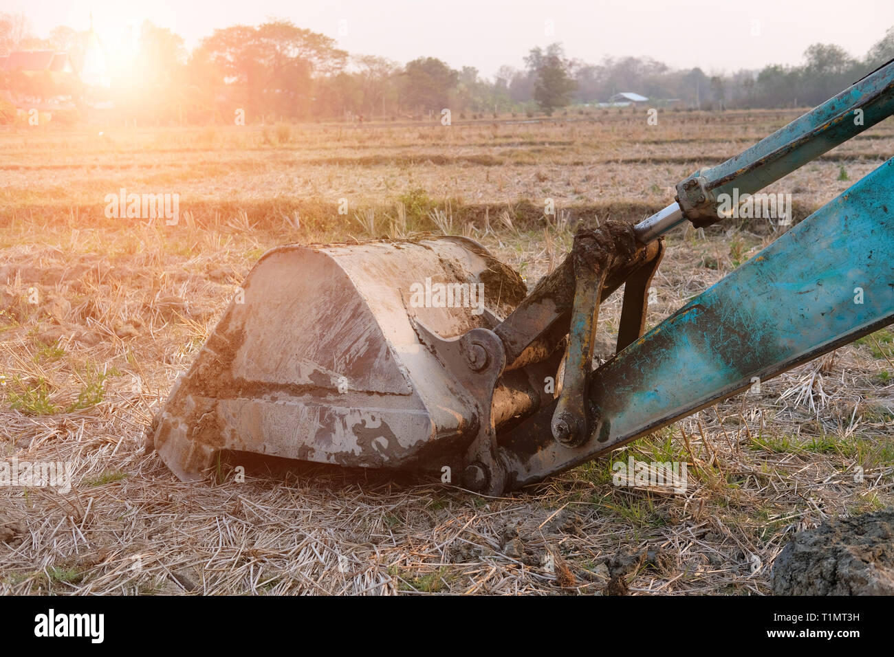 excavator backhoe digger tractor at construction site Stock Photo - Alamy