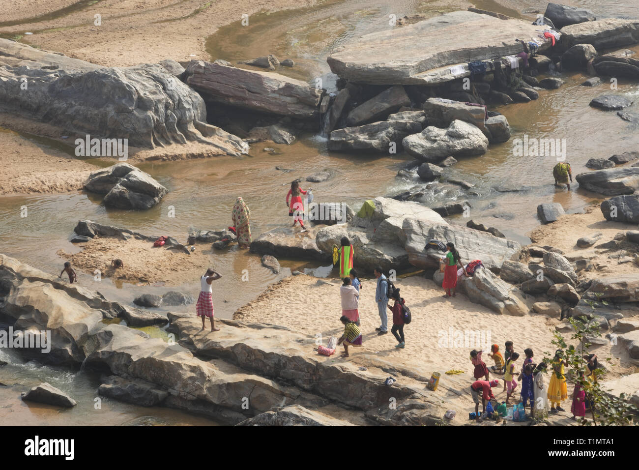 Indian woman bathing in river hi-res stock photography and images - Alamy