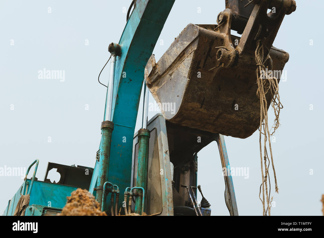 excavator backhoe digger tractor at construction site Stock Photo - Alamy