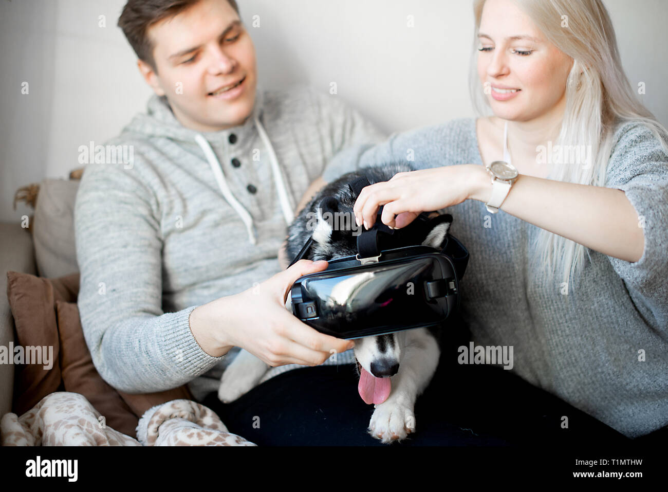 Young couple using vr glasses hi-res stock photography and images - Alamy