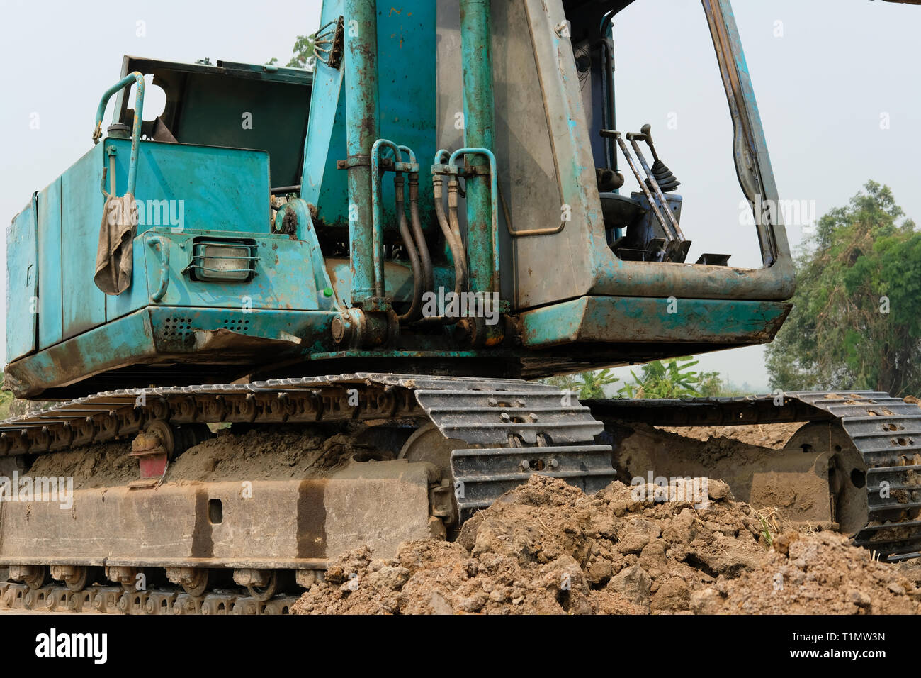 excavator backhoe digger tractor at construction site Stock Photo - Alamy