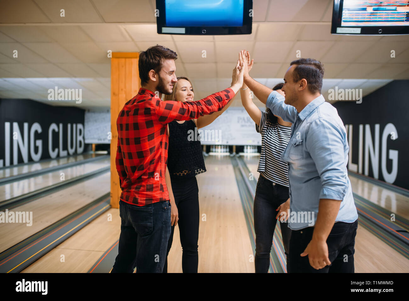 Bowling team joined hands before the competition Stock Photo - Alamy