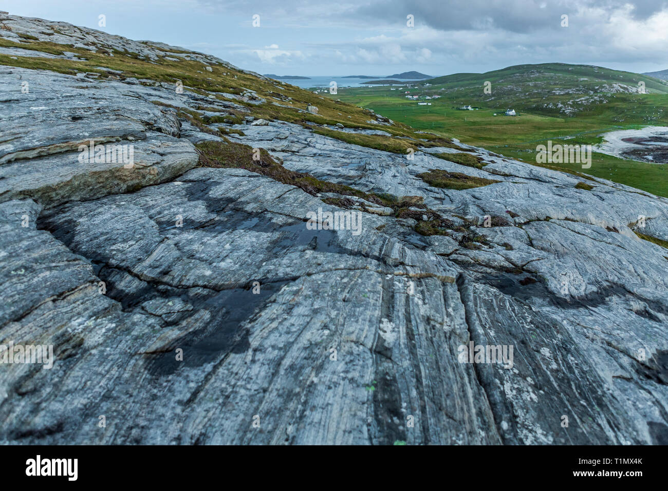 Geological rock formation by the Atlantic Ocean, Isle of Barra, Outer ...