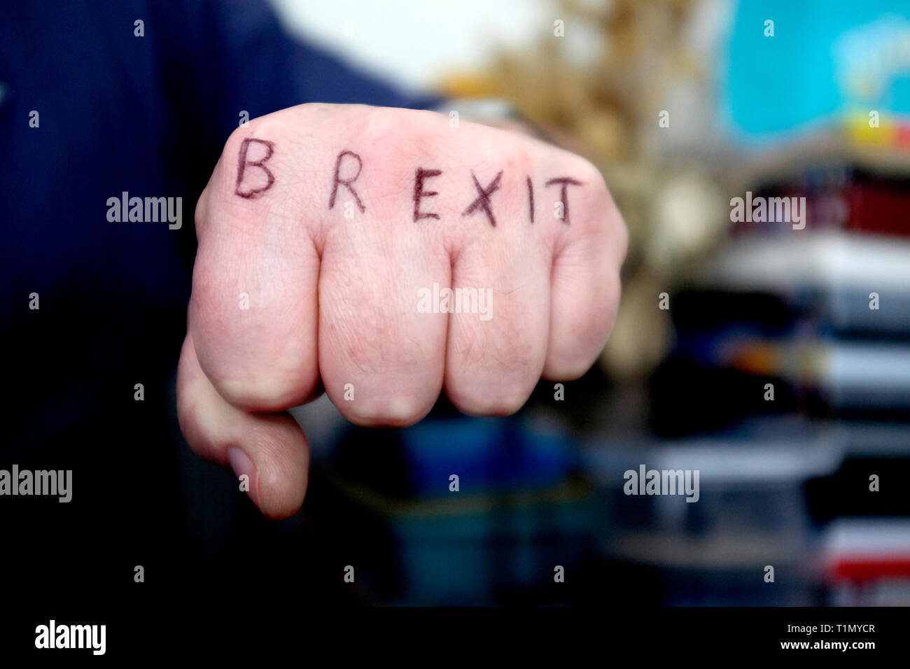 referendum,left,fist,with Brexit,tattooed,on,knuckles,punch,in,the,face ...