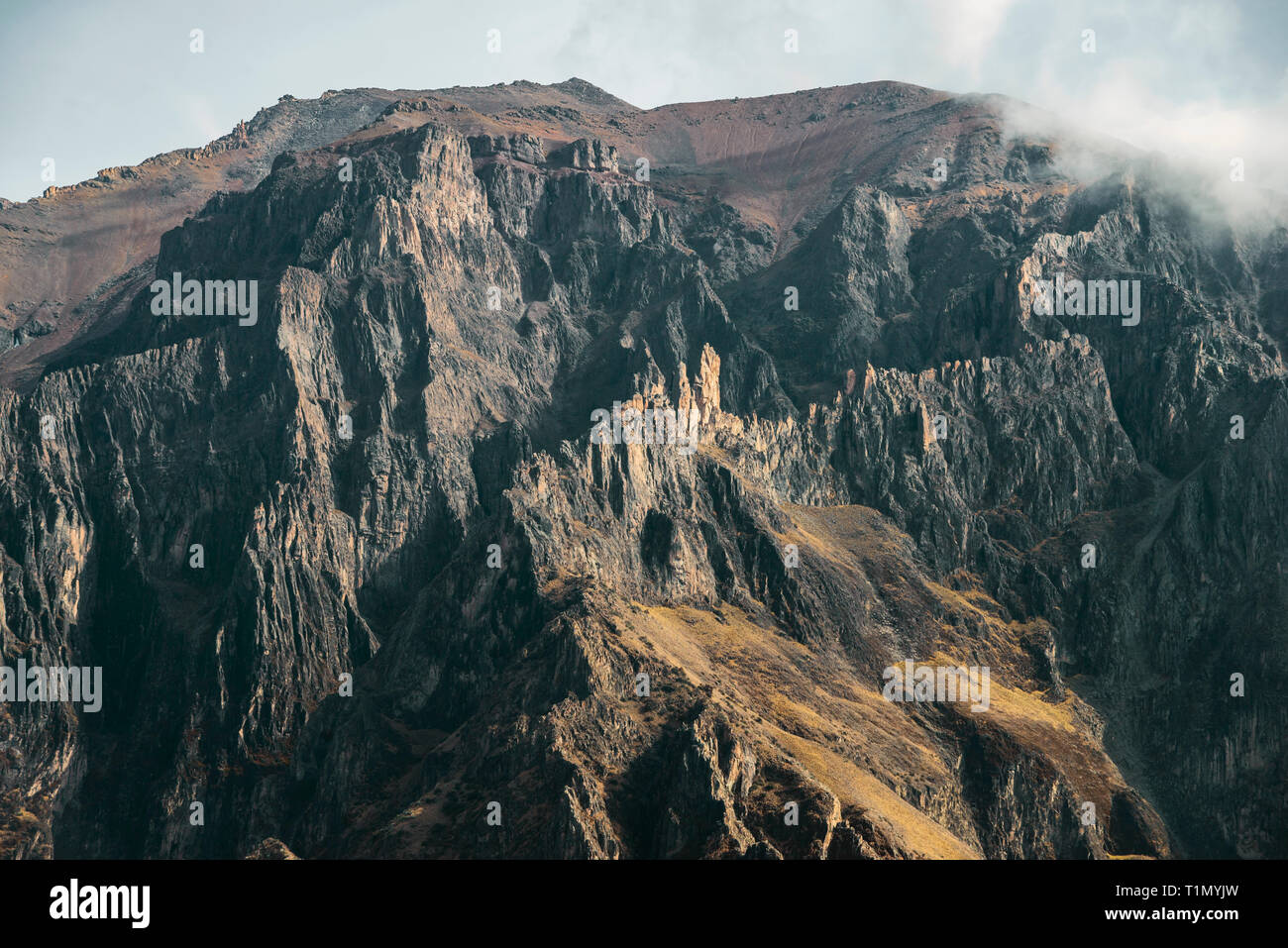 sharp rocky Peruvian mountains by sunny morning Stock Photo - Alamy