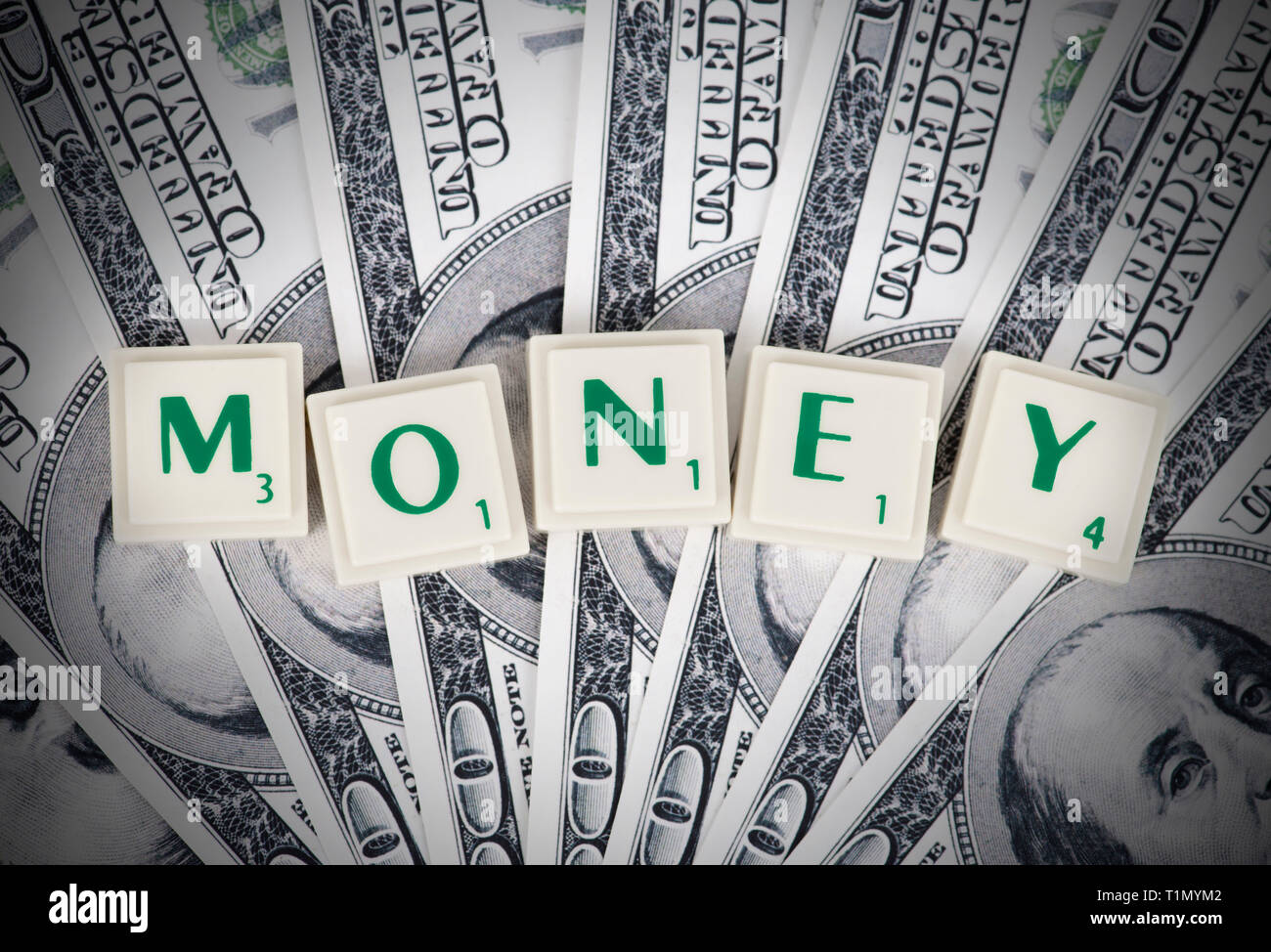 Money sing on stack of 100 dollars Stock Photo - Alamy