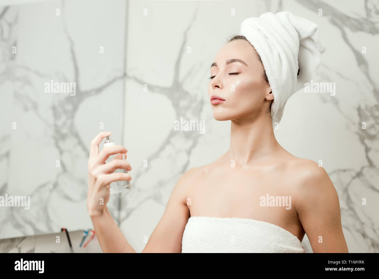 Asian girl wrapped in towel hi-res stock photography and images - Alamy