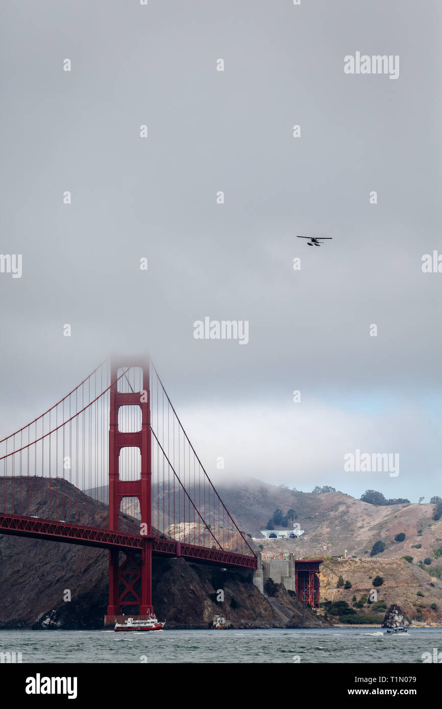 Float plane flies above Golden Gate bridge Stock Photo - Alamy