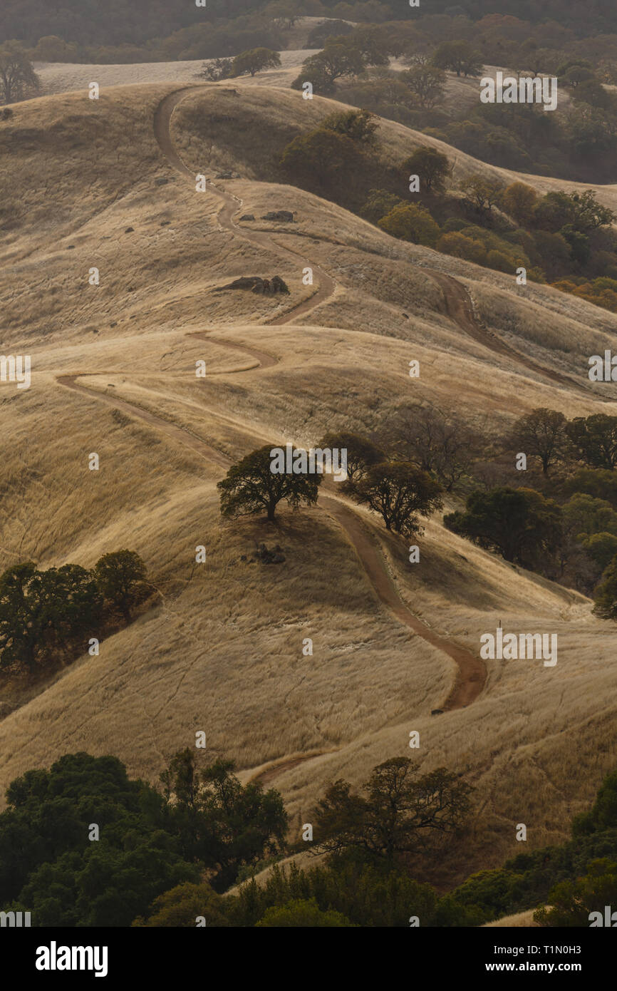 Mountain top view of ridge top trail back down arid grasslands of Mt ...