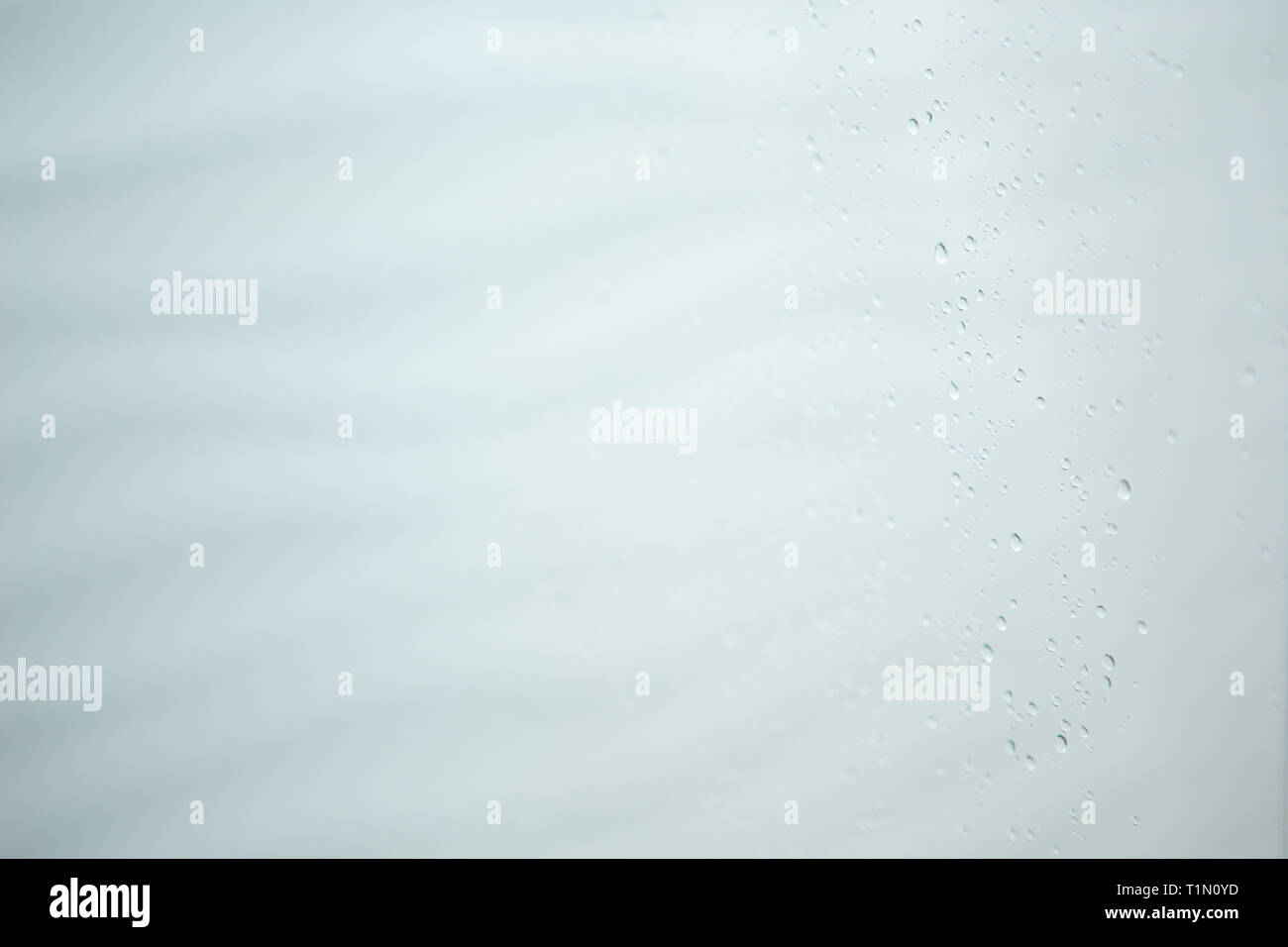 water droplets on glass in front of shower Stock Photo - Alamy