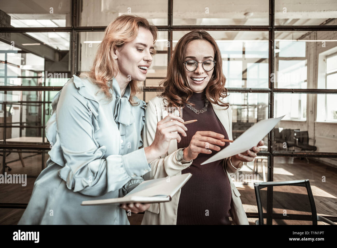 Beautiful pleased young ladies hi-res stock photography and images - Alamy