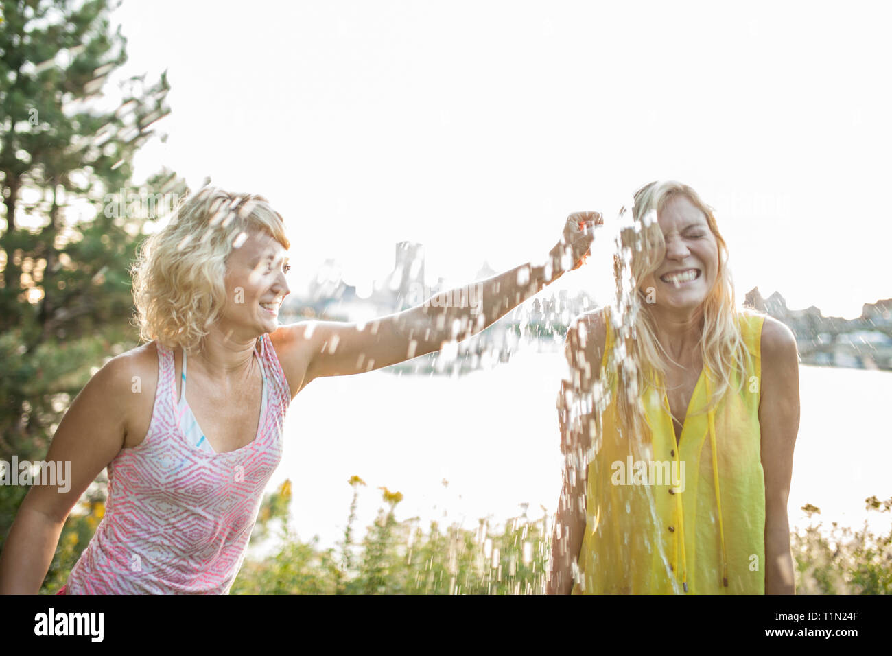 Throwing water girl hi-res stock photography and images - Alamy