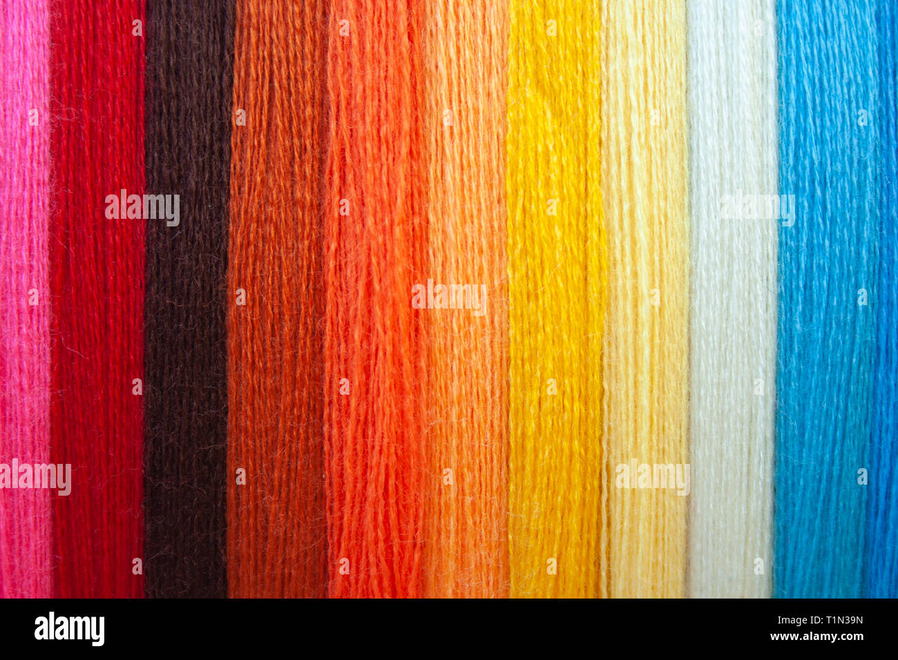 Many multi colored yarn strings for design background. Texture of ...