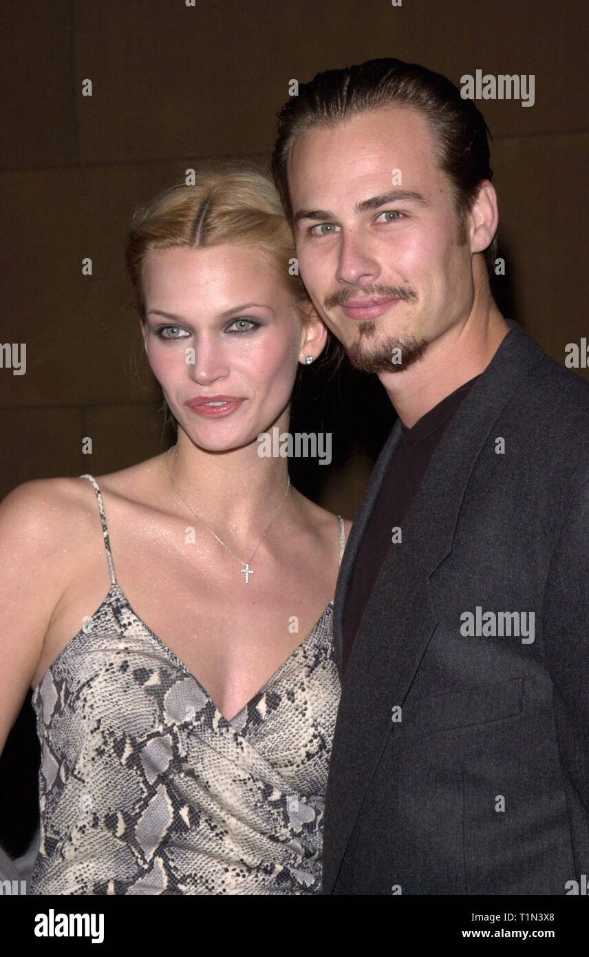 LOS ANGELES, CA. December 13, 1999: Actor Liam Waite & Actress ...