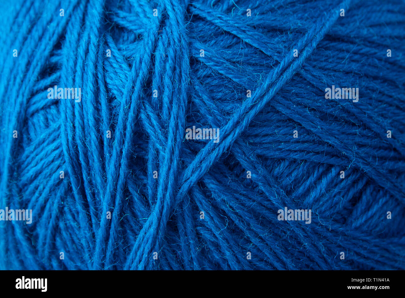 Blue yarn clew close up texture. Blue wool background Stock Photo - Alamy