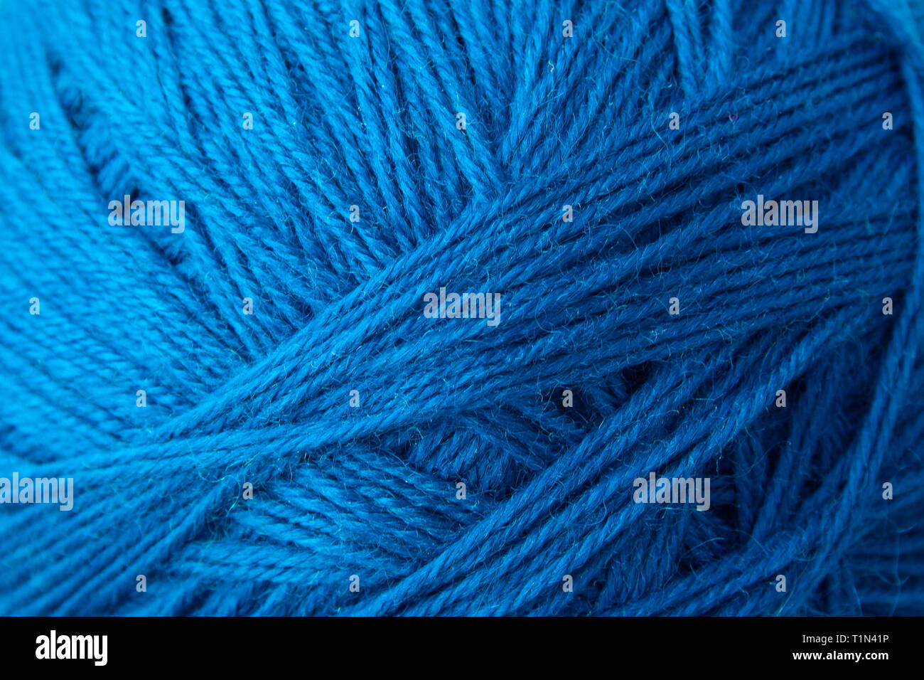 Blue yarn clew close up texture. Blue wool background Stock Photo - Alamy