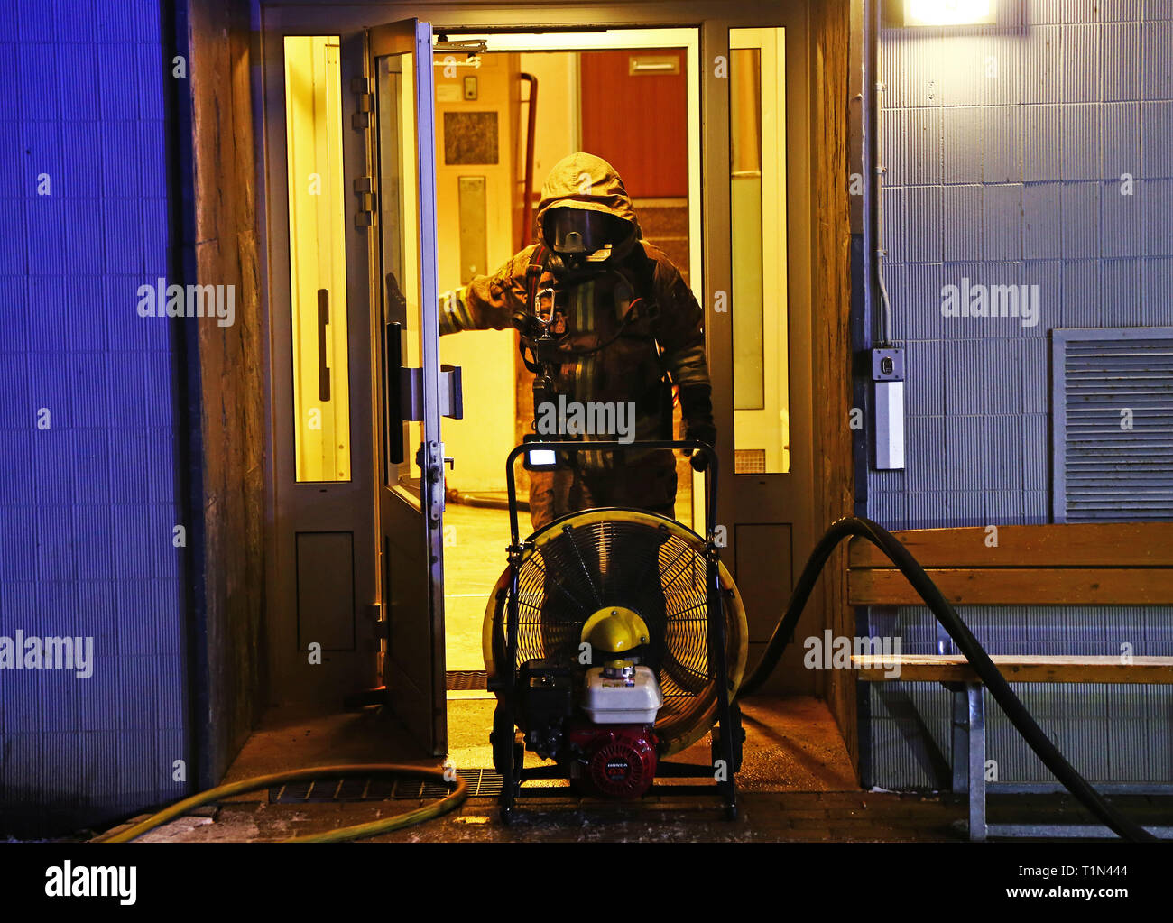 Fireman at a fire Stock Photo - Alamy