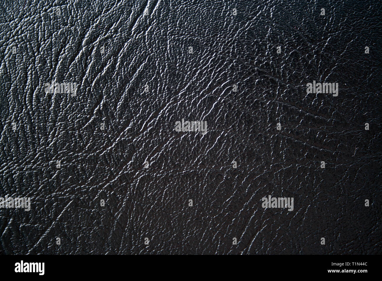 Black artificial leather texture close up for design Stock Photo - Alamy