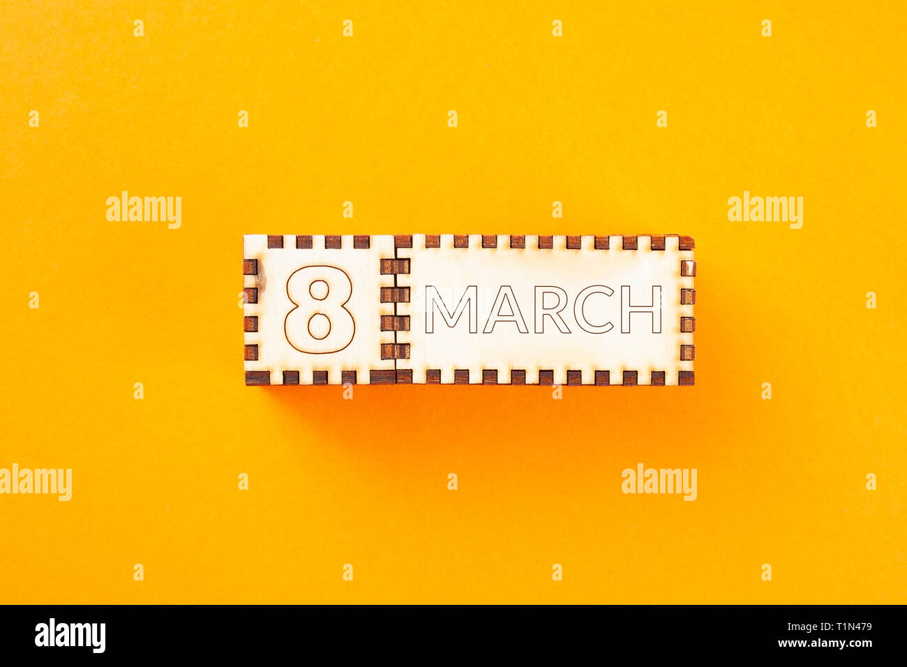 wooden cubes with the inscription March 8 on orange background. 8 march ...