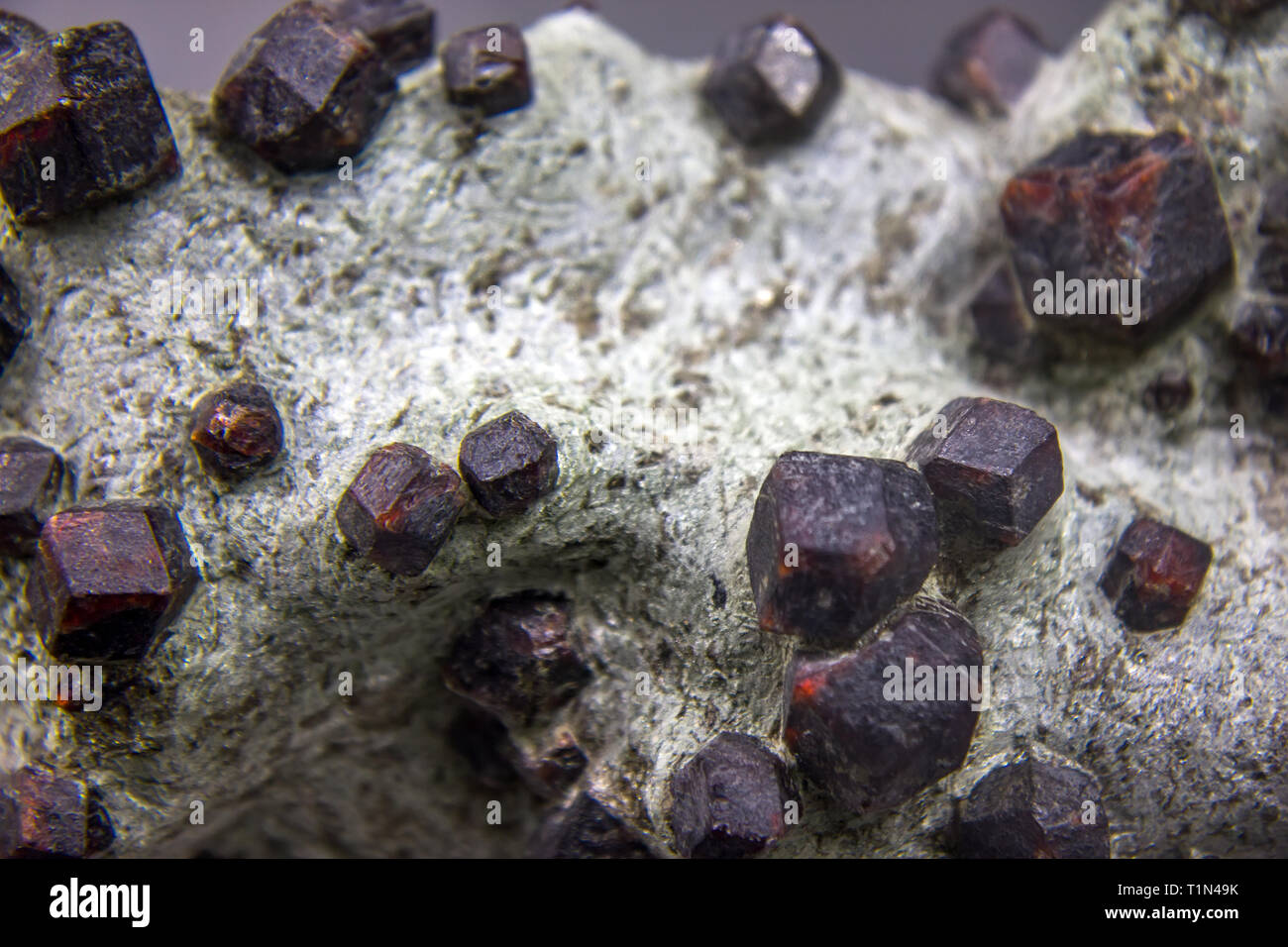 Druse of crystals garnet stone close-up from Tyrol, Austria Stock Photo ...