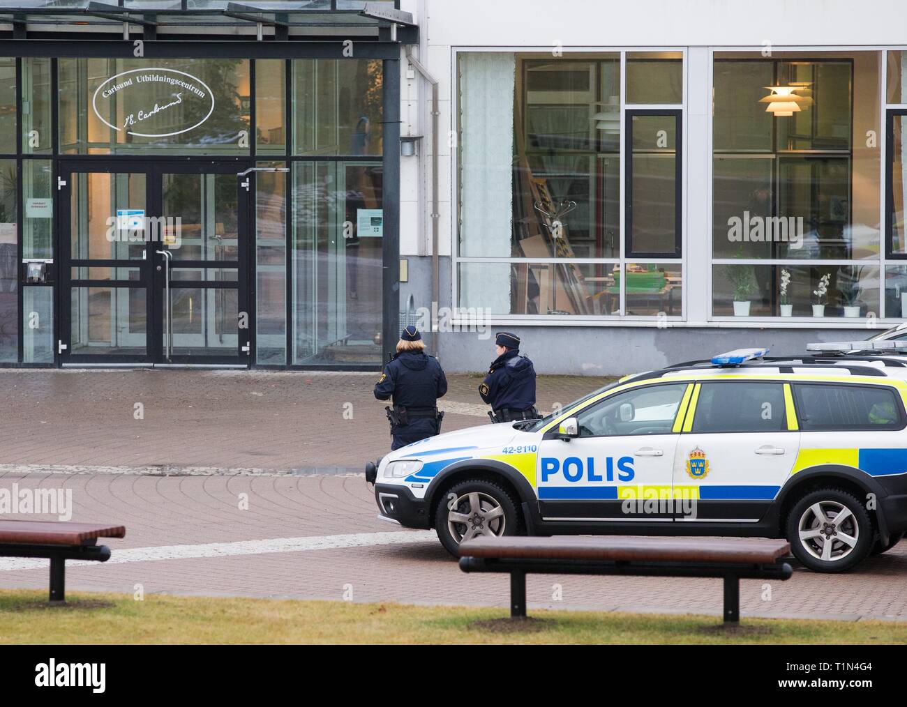 two police officers outside a school Stock Photo - Alamy