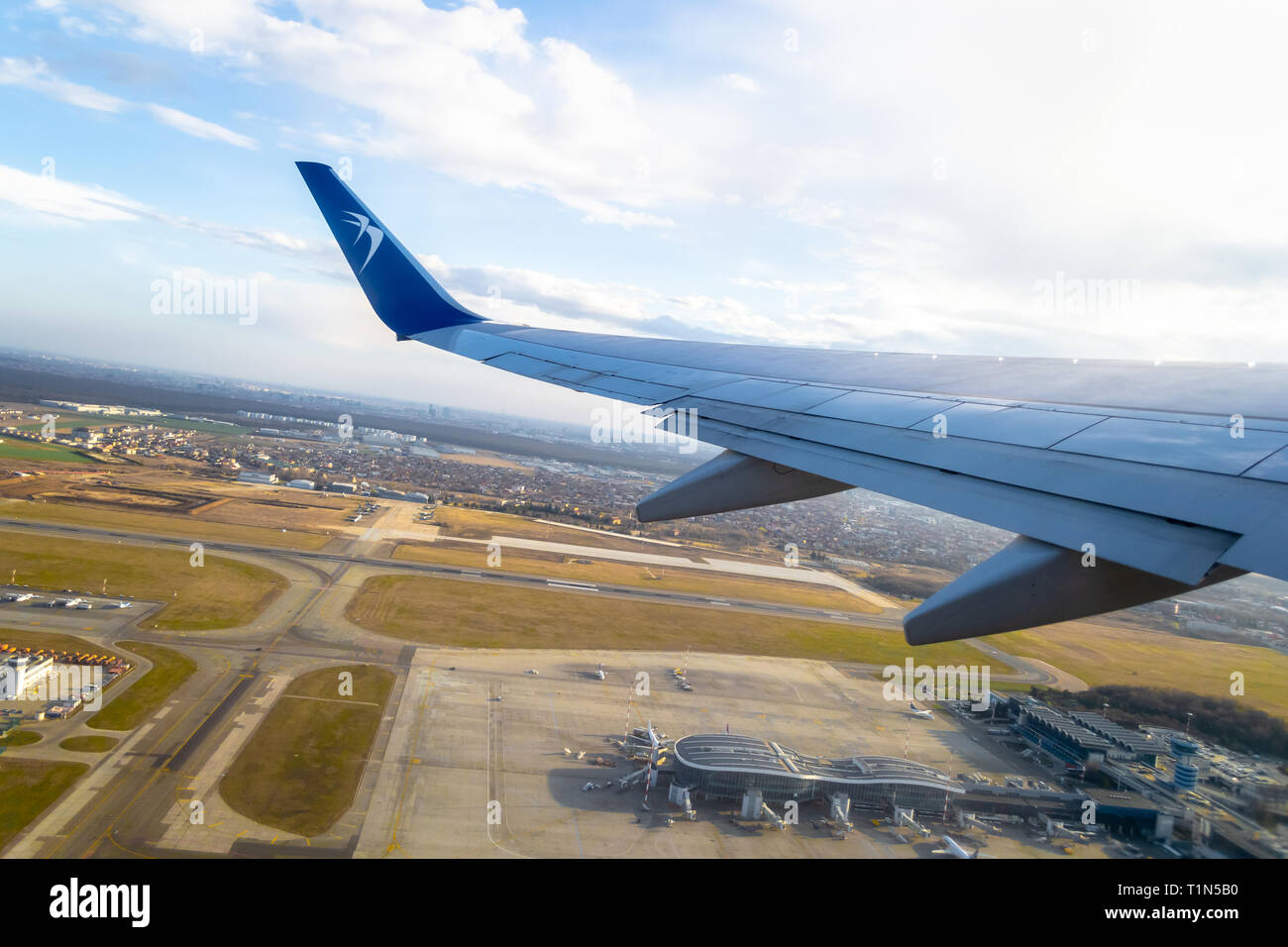 Bucharest, Romania - 9 March 2019: Blue Air plane taking off from Henri ...