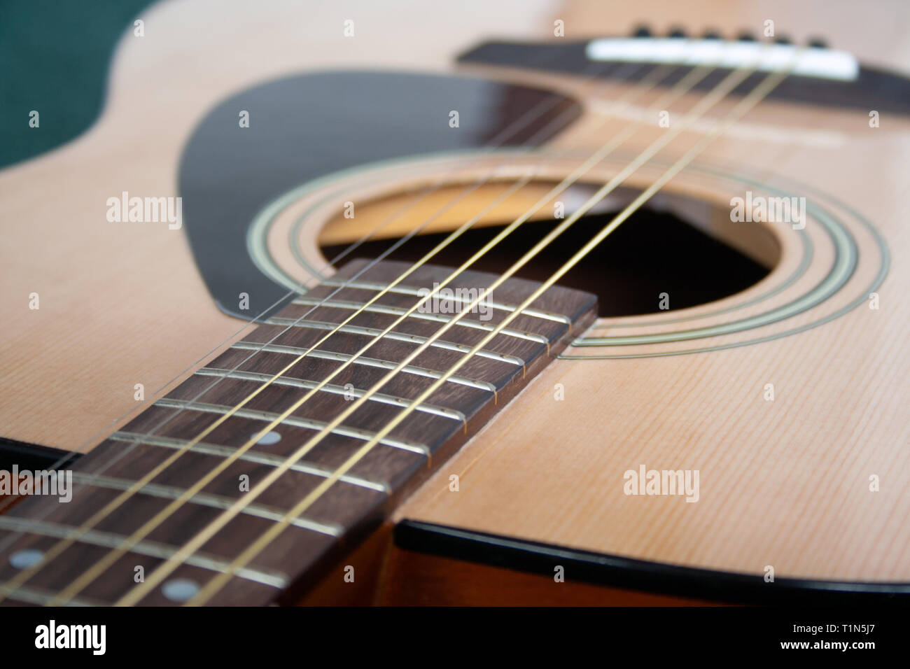 Close up of acoustic guitar with metal strings. Music concept. Hobby ...