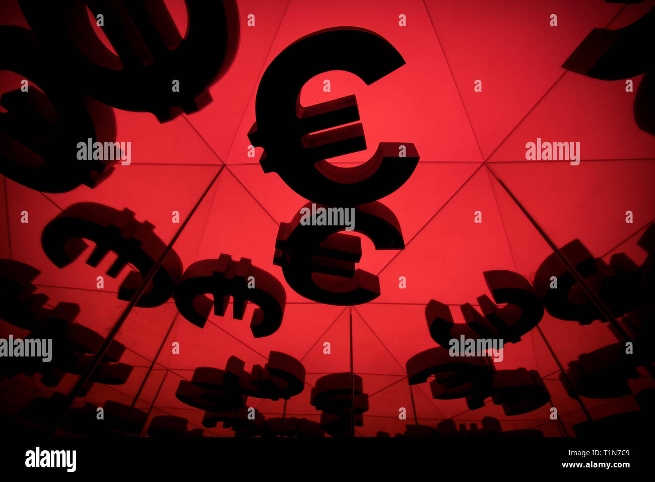 Euro Currency Symbol With Many Mirroring Images of Itself on Red ...