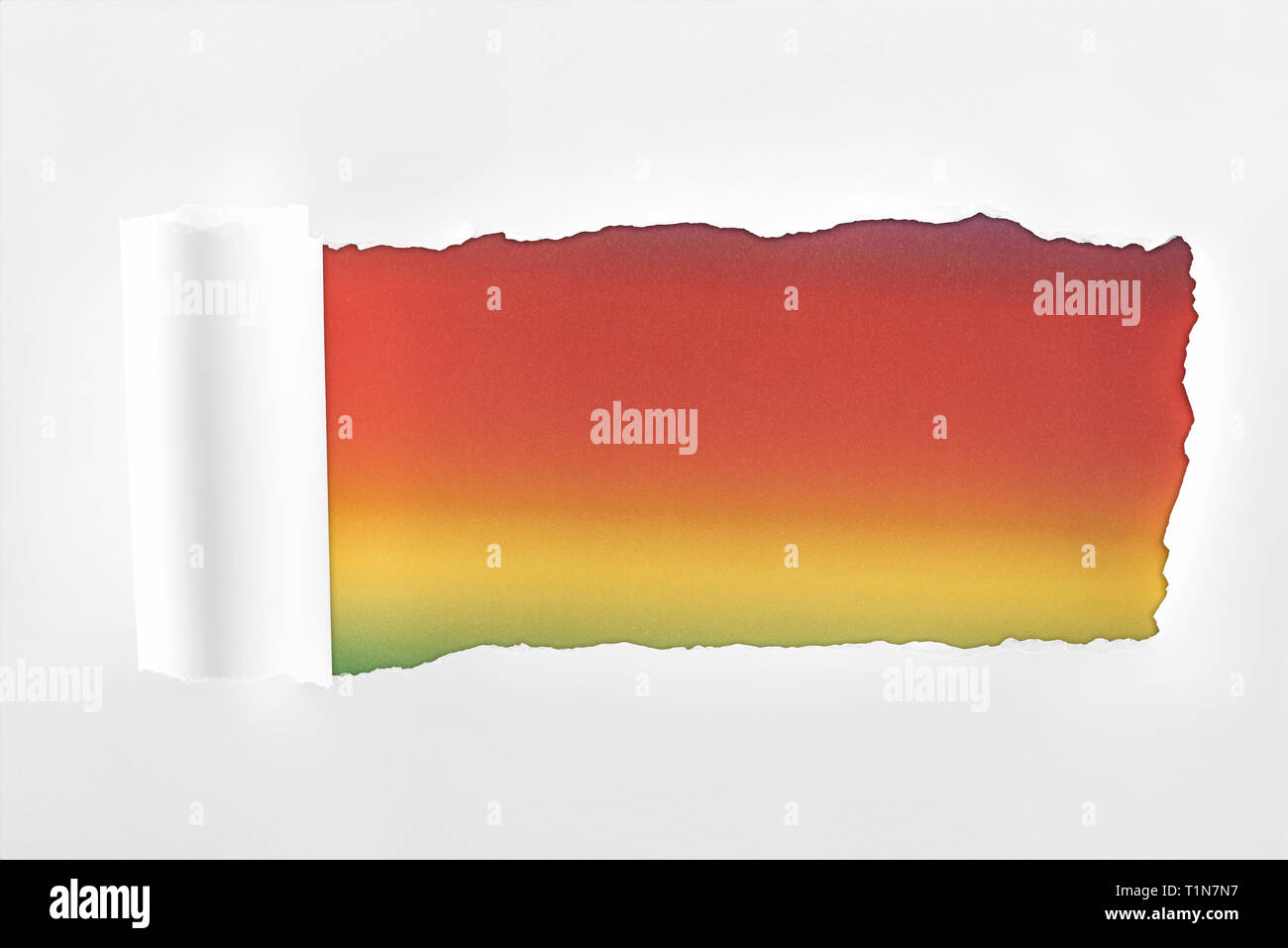 textured white paper with rolled edge on multicolored background Stock ...