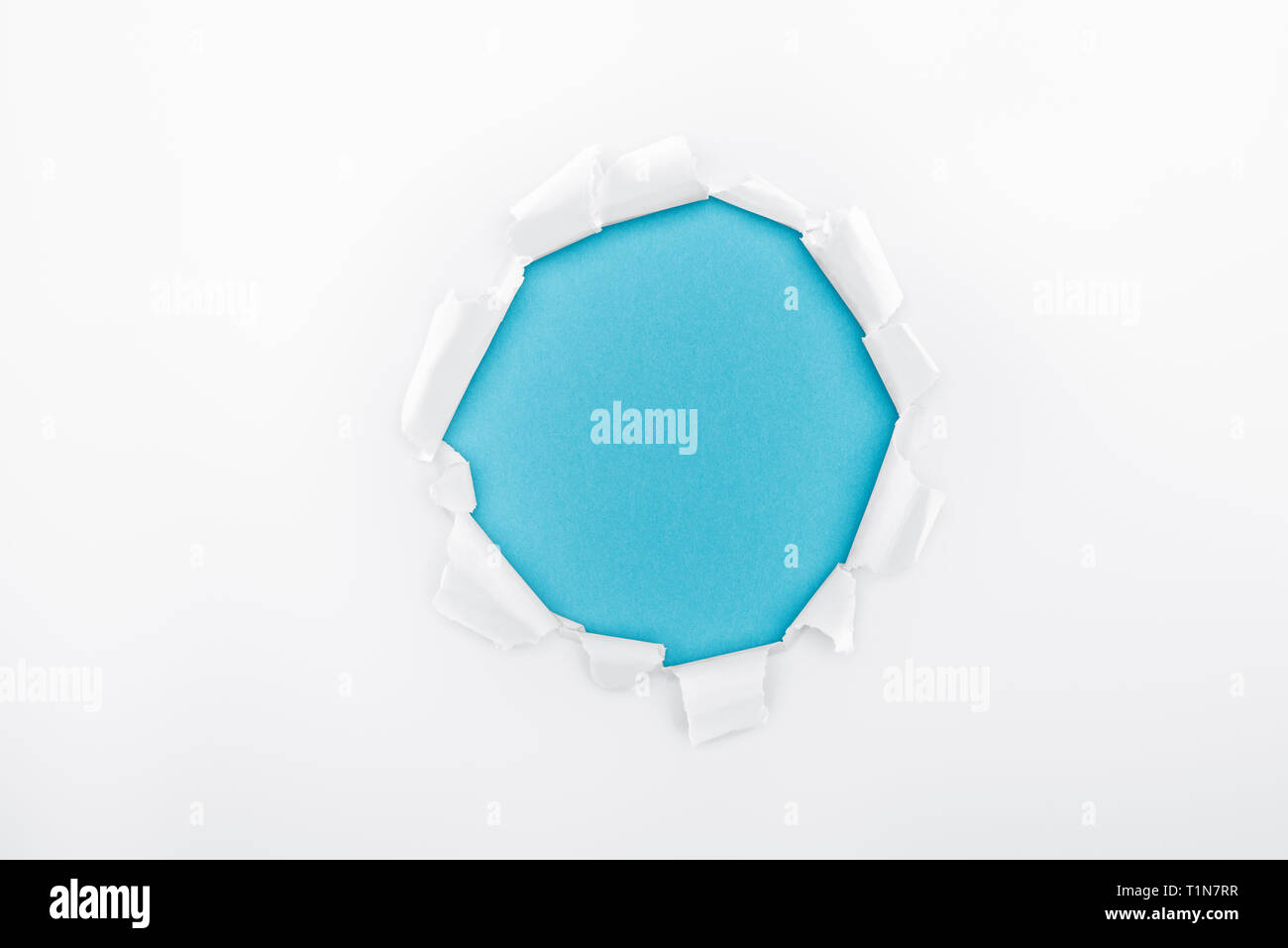 Tattered hole in white hi-res stock photography and images - Alamy