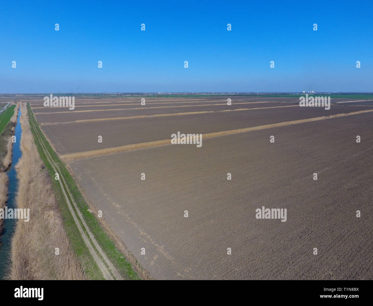 plowed field top view of the plowed rice fields Stock Photo - Alamy