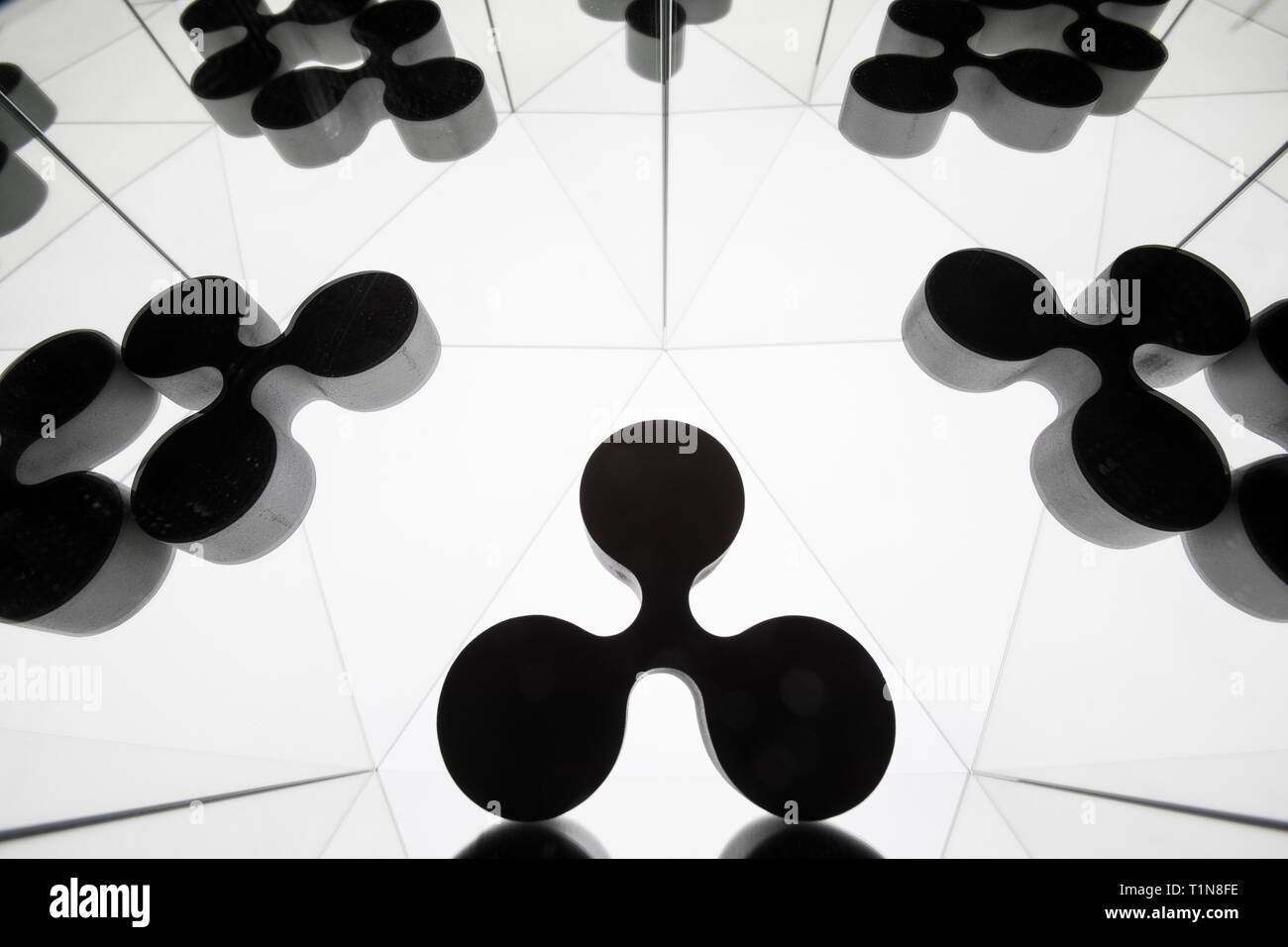 Ripple Currency Symbol With Many Mirroring Images of Itself on White ...