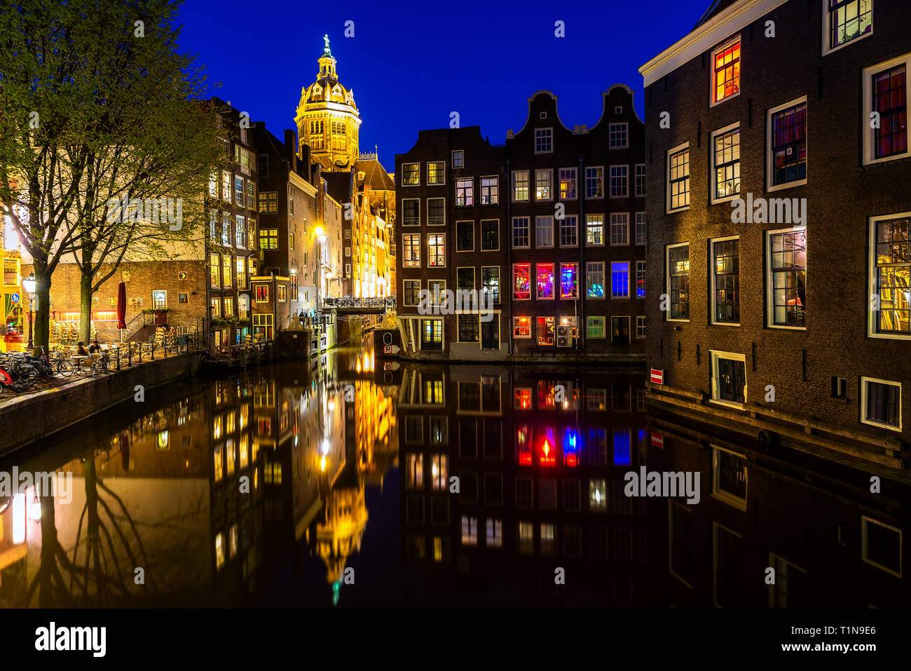 City view of Amsterdam, the Netherlands with Amstel river at night ...