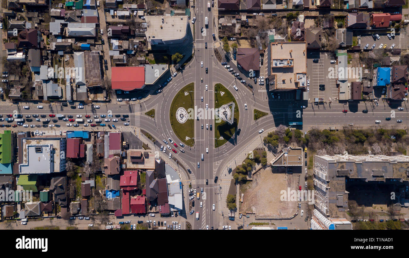 Top down view of urban city traffic roundabout Stock Photo - Alamy