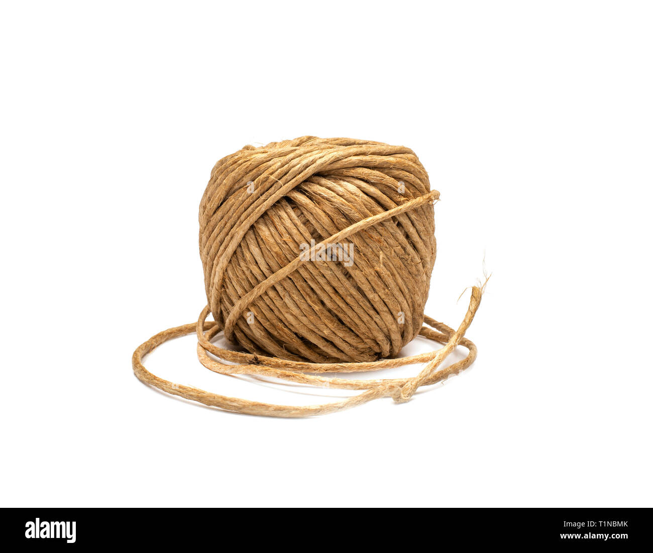 roll of twine on a white background Stock Photo - Alamy