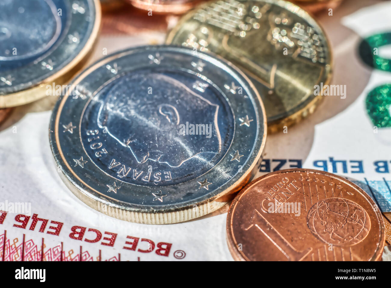 Euro banknotes and coins close up Stock Photo - Alamy
