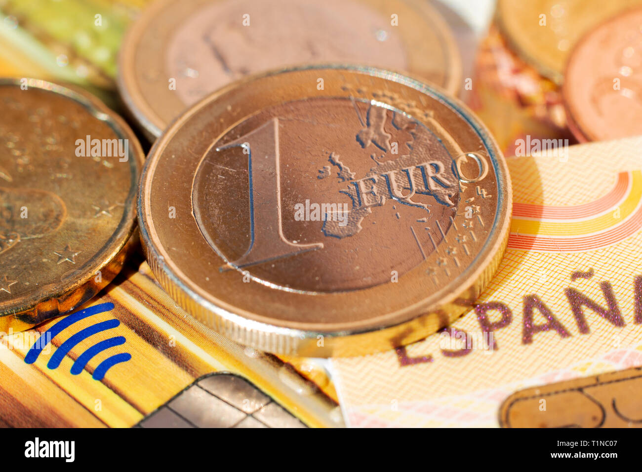 Euro banknotes and coins close up. Chip. Contact less Stock Photo - Alamy