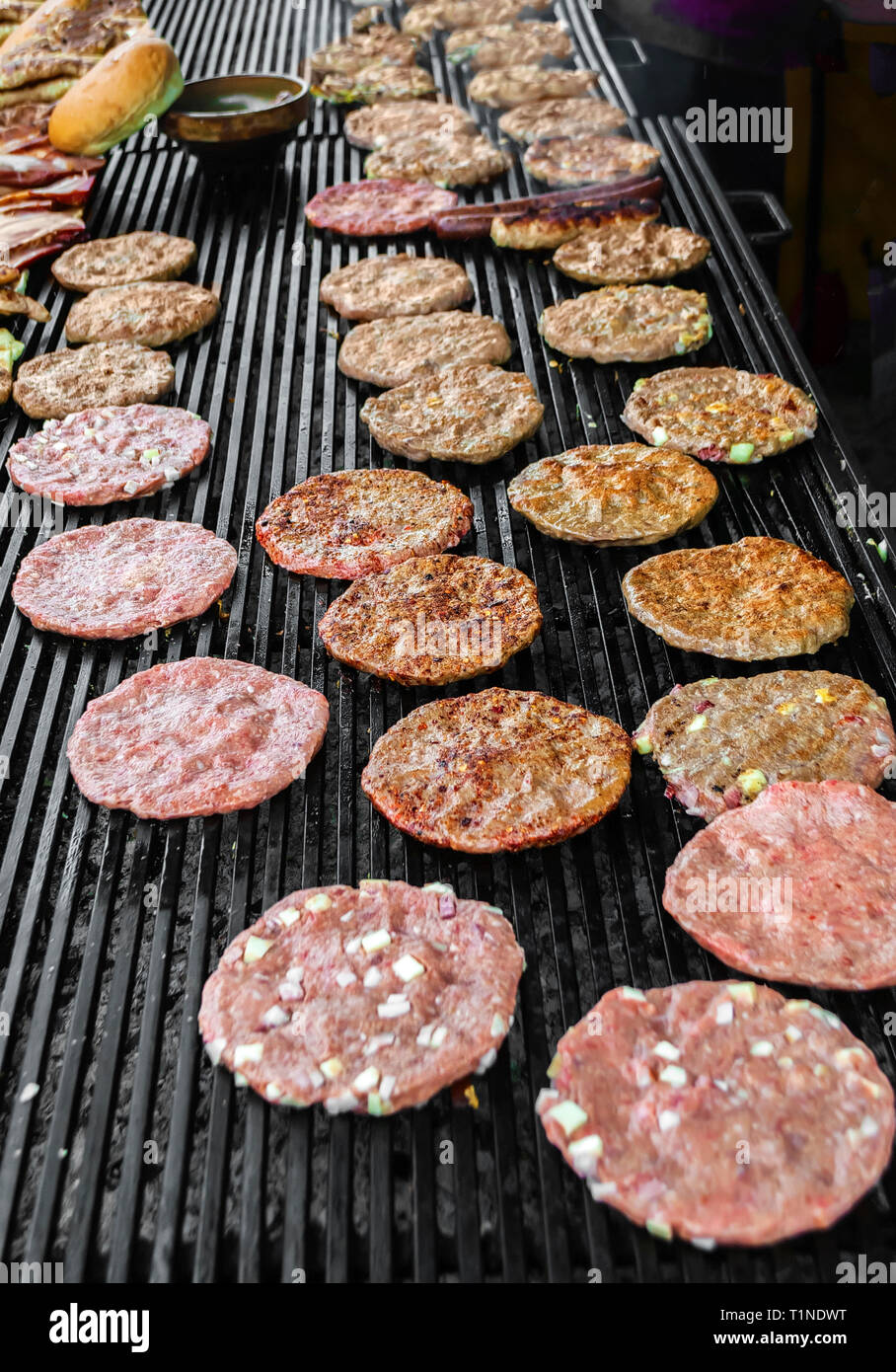 Roasting meatballs;the traditional grill of Serbia Stock Photo - Alamy