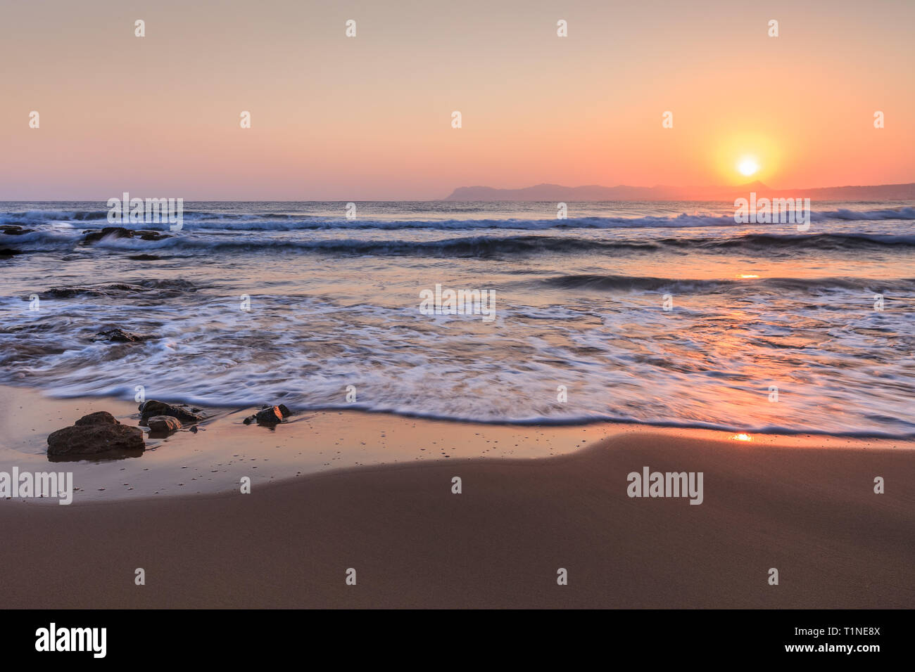 sunrise on the beach in Crete island, Greece Stock Photo - Alamy