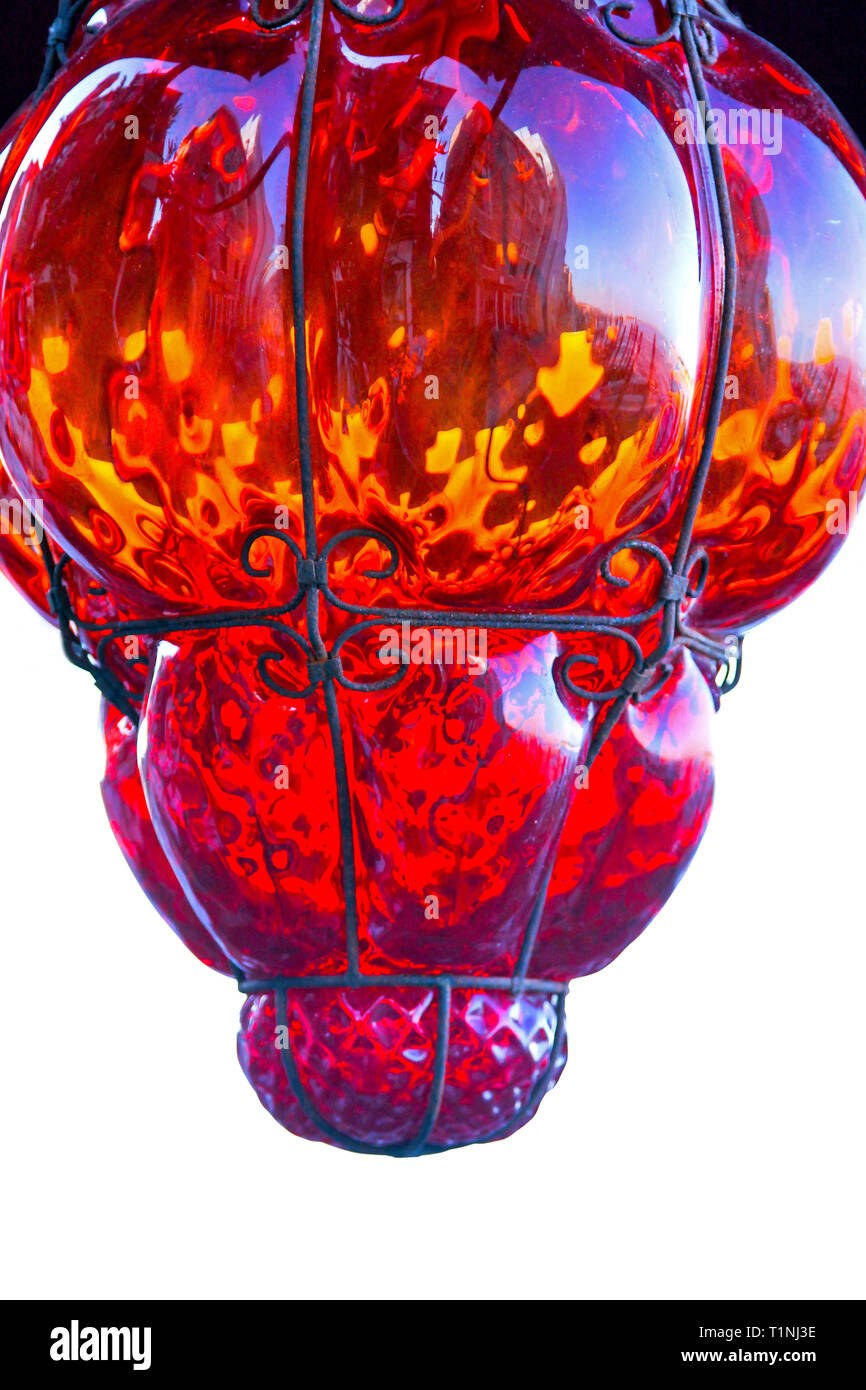 Red chandelier in iron net made of Murano glass Stock Photo - Alamy