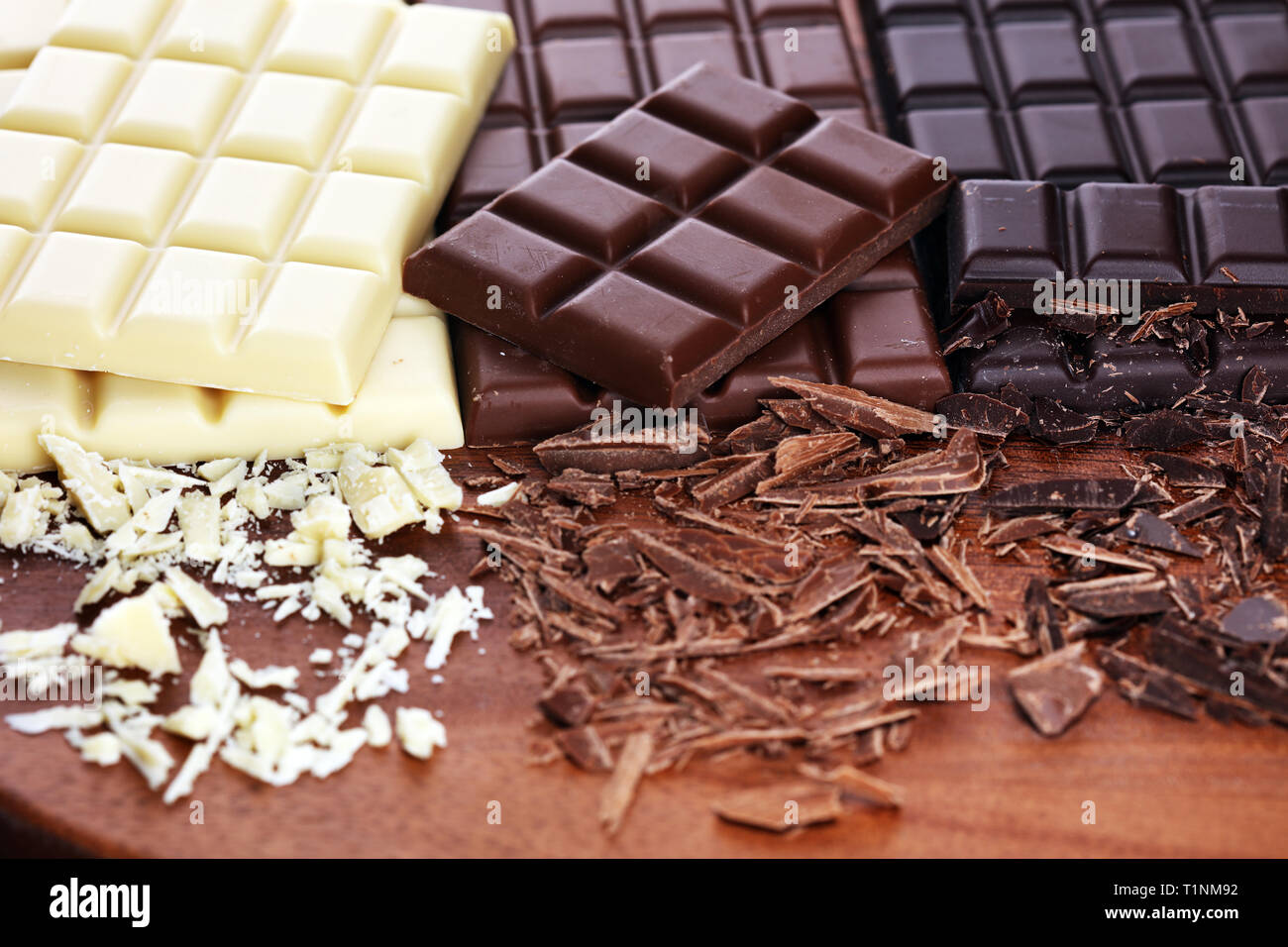 chocolate in diffrent color. milk, dark and white chocolate bars and ...