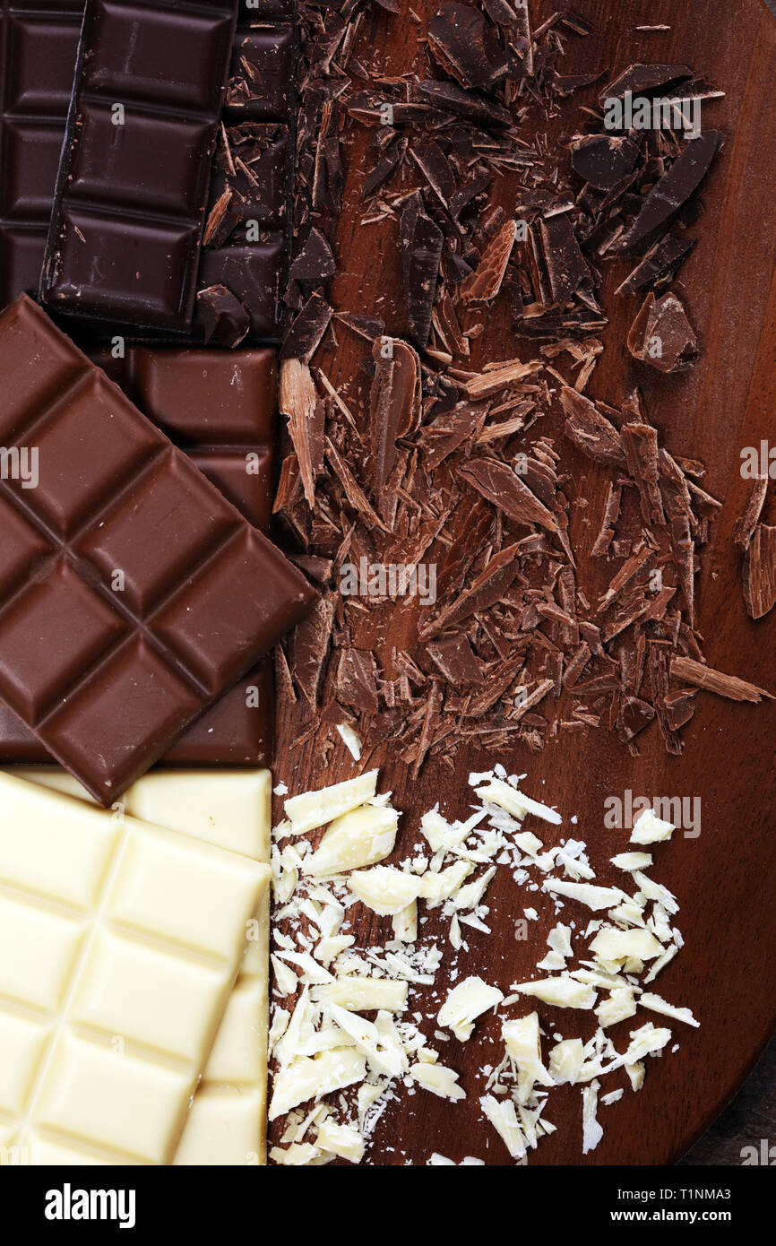 chocolate in diffrent color. milk, dark and white chocolate bars and ...