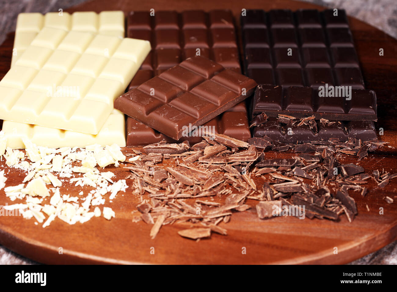 chocolate in diffrent color. milk, dark and white chocolate bars and ...