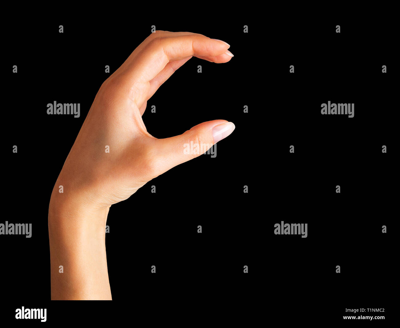 Woman hand showing picking up pose or holding Stock Photo - Alamy
