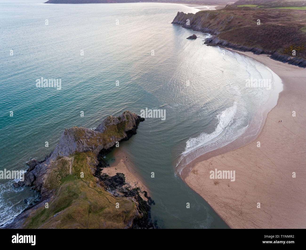 Aerial view of Three Cliffs Bay south coast beach the Gower Peninsula ...